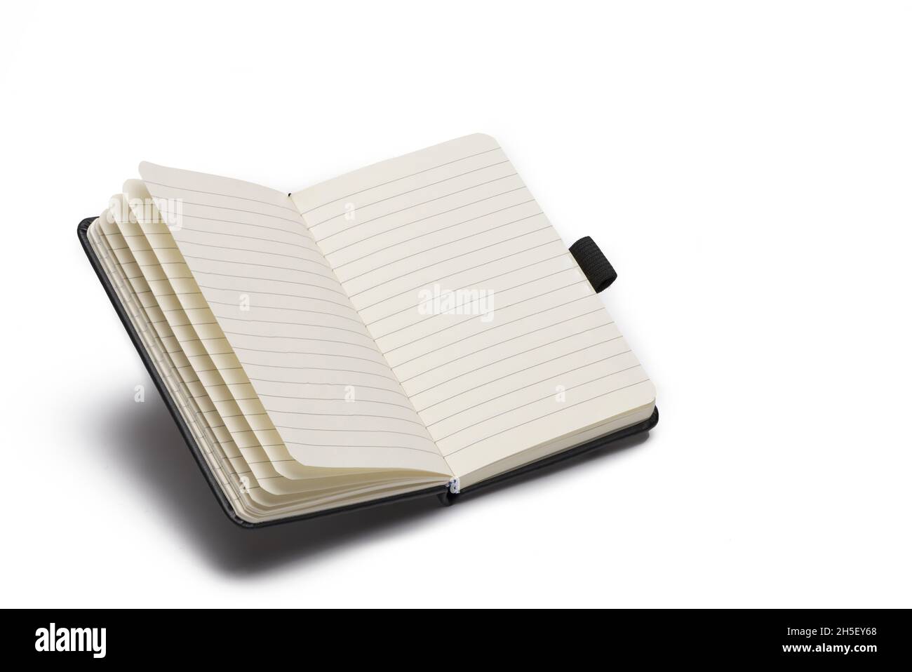 Close up of opened vintage leather notebook isolated on white ...