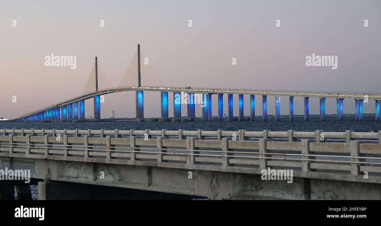 The view of the Bob Graham Sunshine Skyway Bridge lit in blue lights ...