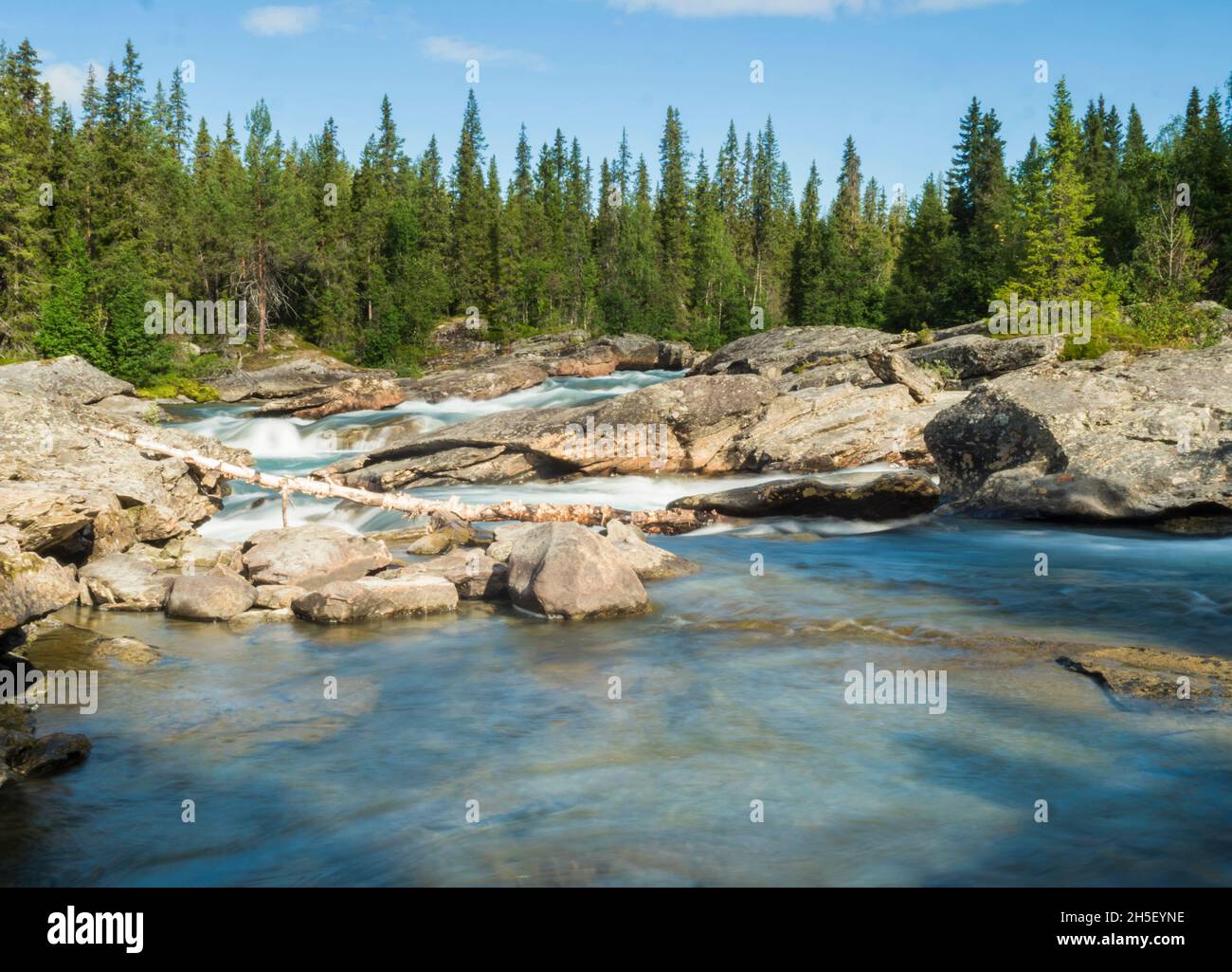 Beautiful landscape with long exposure water stream and cascade of ...