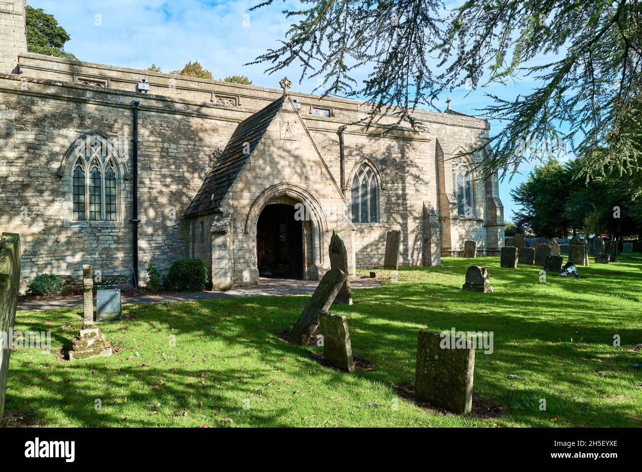 The south side of the christian church of St John, Corby, England Stock ...