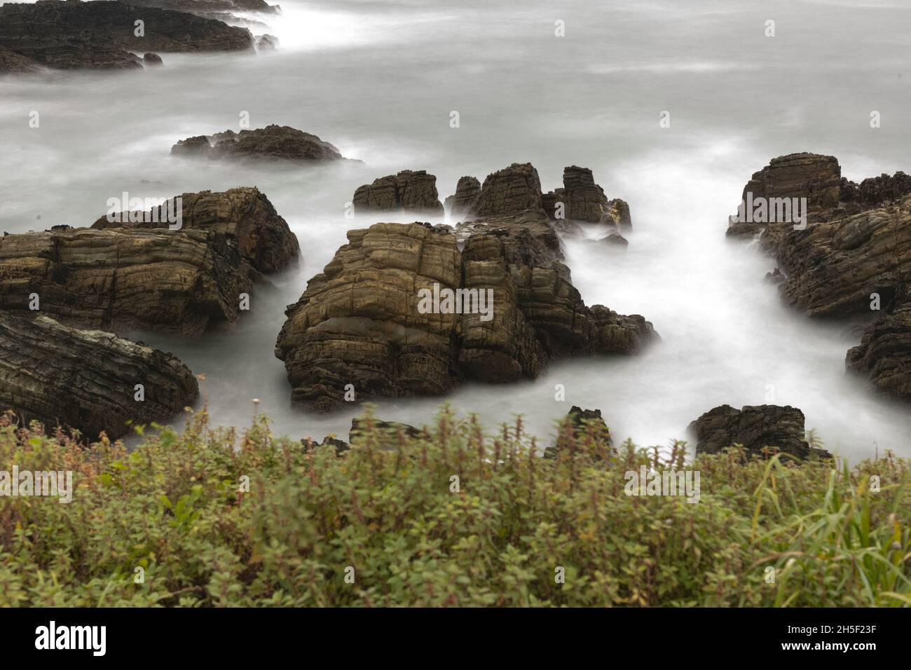 Beautiful view of rock formations in a river Stock Photo - Alamy