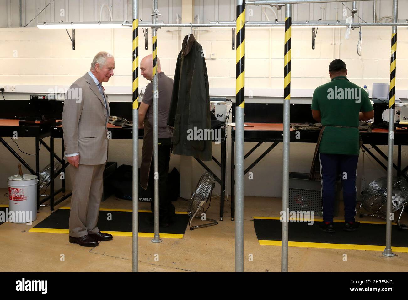 The Prince of Wales (left) speaks to reproofer Peter Bristow during a ...