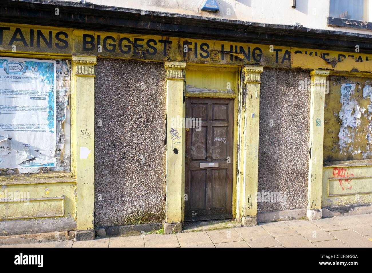 An abandoned inner city shop front in Sheffield, formerly supplying ...