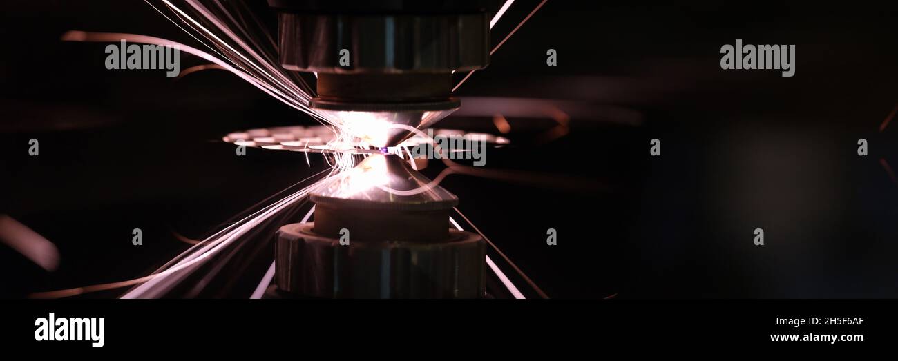 Laser cutting of metal closeup. Metal cutting and laser sparks Stock ...
