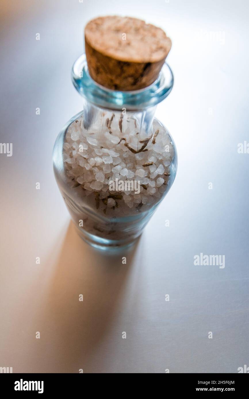 A glass jar with sea salt stands alone on a white background Stock ...