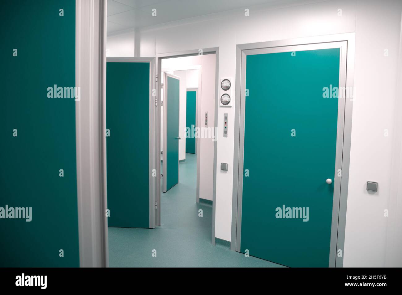 Laboratory corridor with green doors and measuring sensors Stock Photo ...