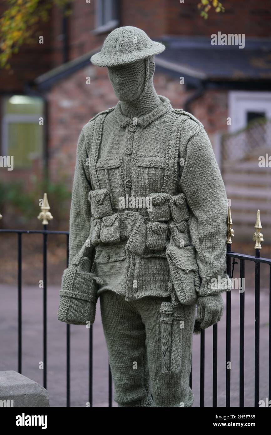 A life-sized knitted soldier has been placed at the War Memorial Clock ...