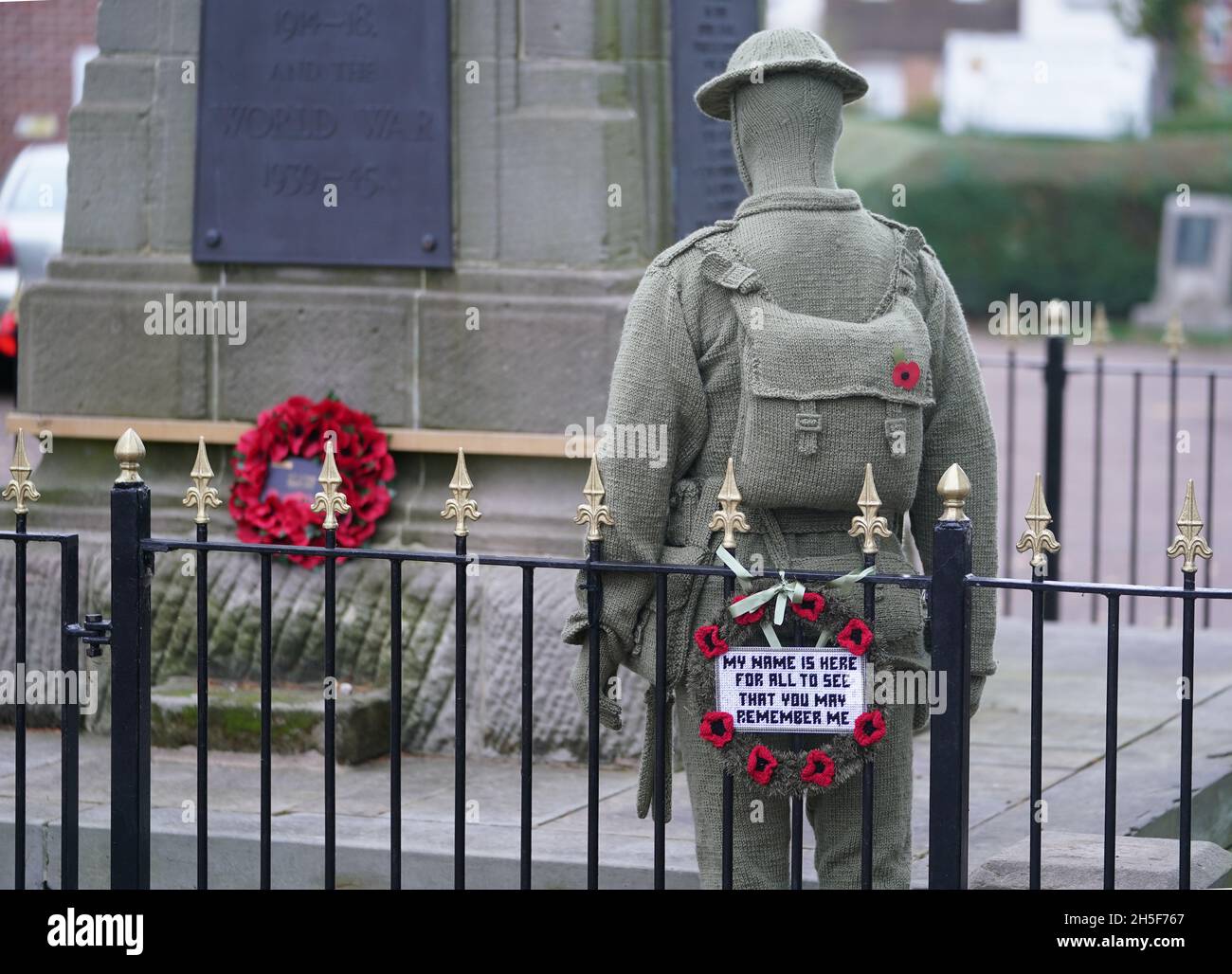 A life-sized knitted soldier has been placed at the War Memorial Clock ...