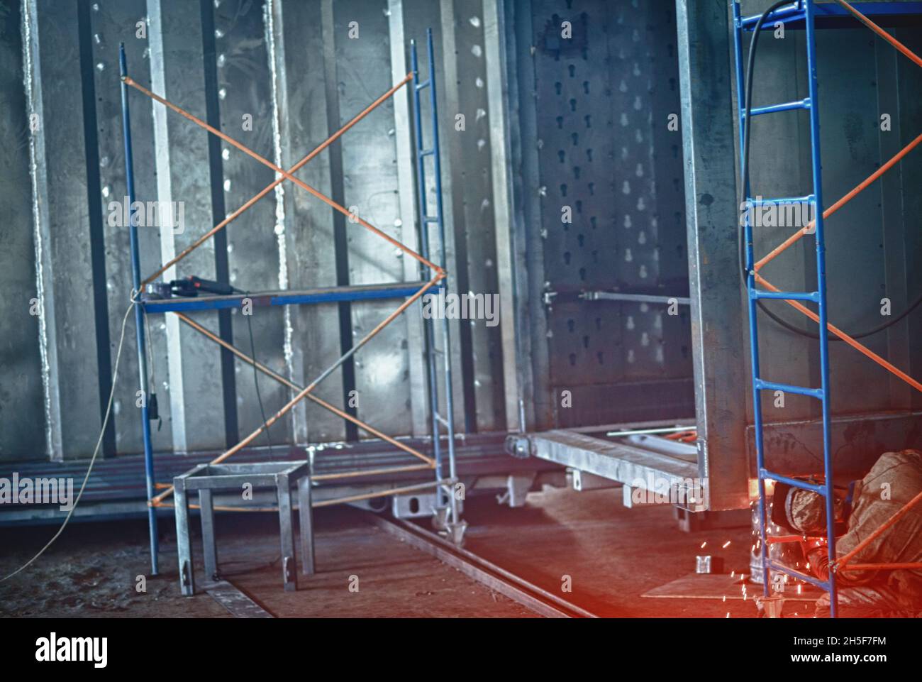 Assembly of metal containers at the factory Stock Photo - Alamy