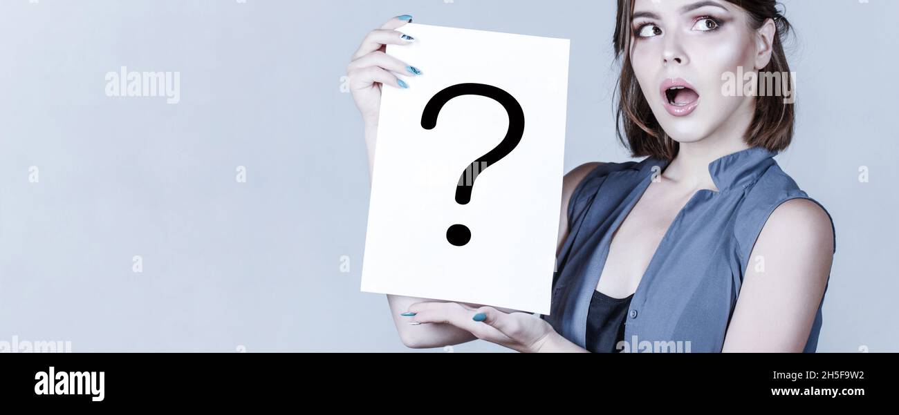 Woman with doubtful expression and question marks. Thinking woman. Girl ...