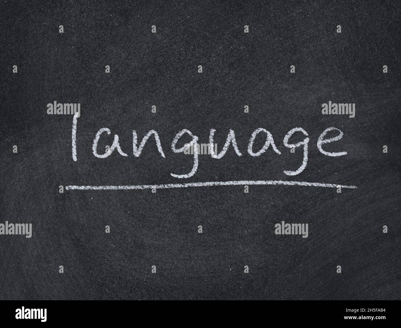 language concept word on blackboard background Stock Photo - Alamy