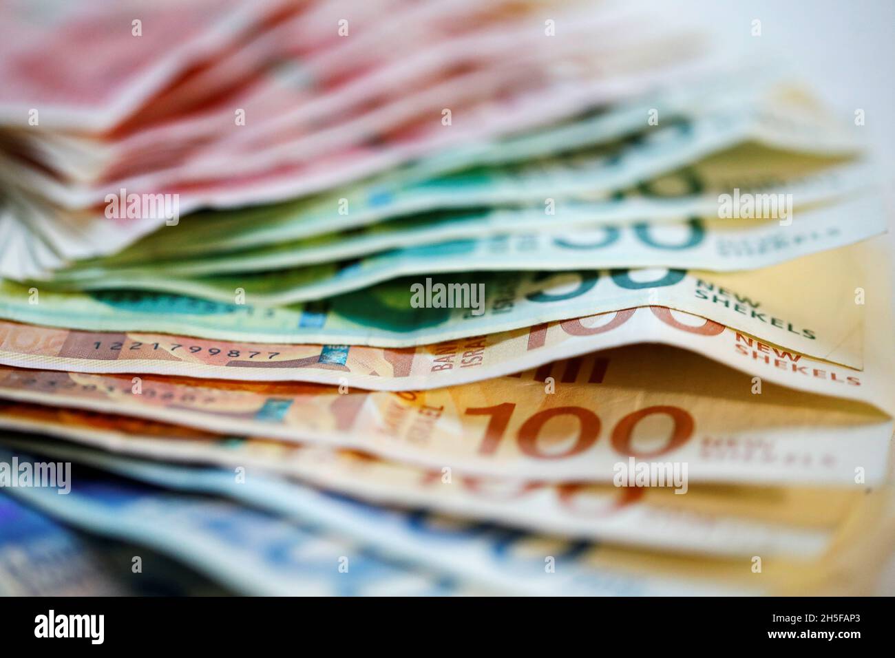 New Israeli Shekel banknotes are seen in this picture illustration ...