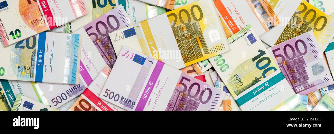 bundles of many Euro banknotes Stock Photo - Alamy