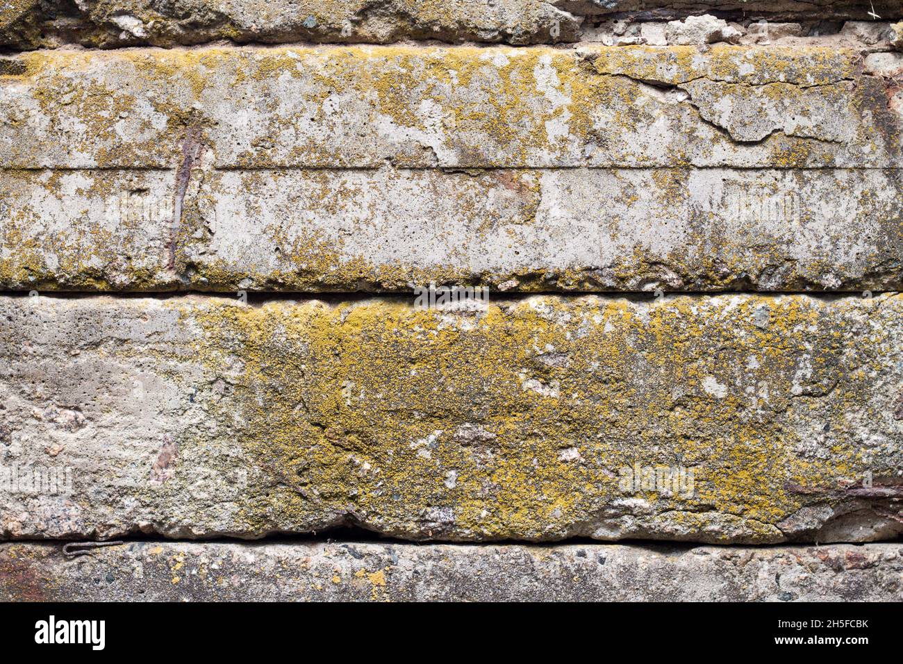 Old concrete blocks wall background closeup. Industrial background ...