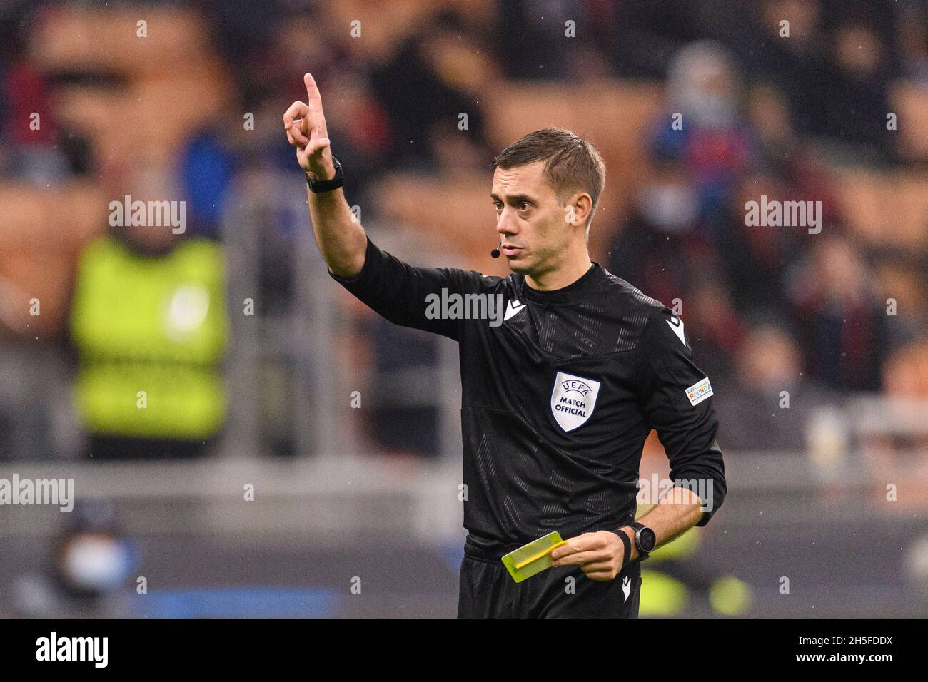 MILAN, ITALY - NOVEMBER 03: Referee Clément Turpin gestures during the ...