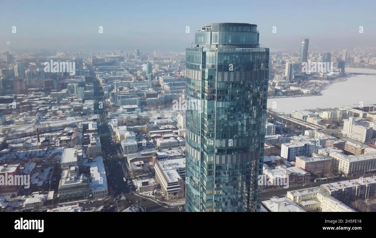 Top view of a skyscraper and modern city in winter. Gorgeous skyscraper ...