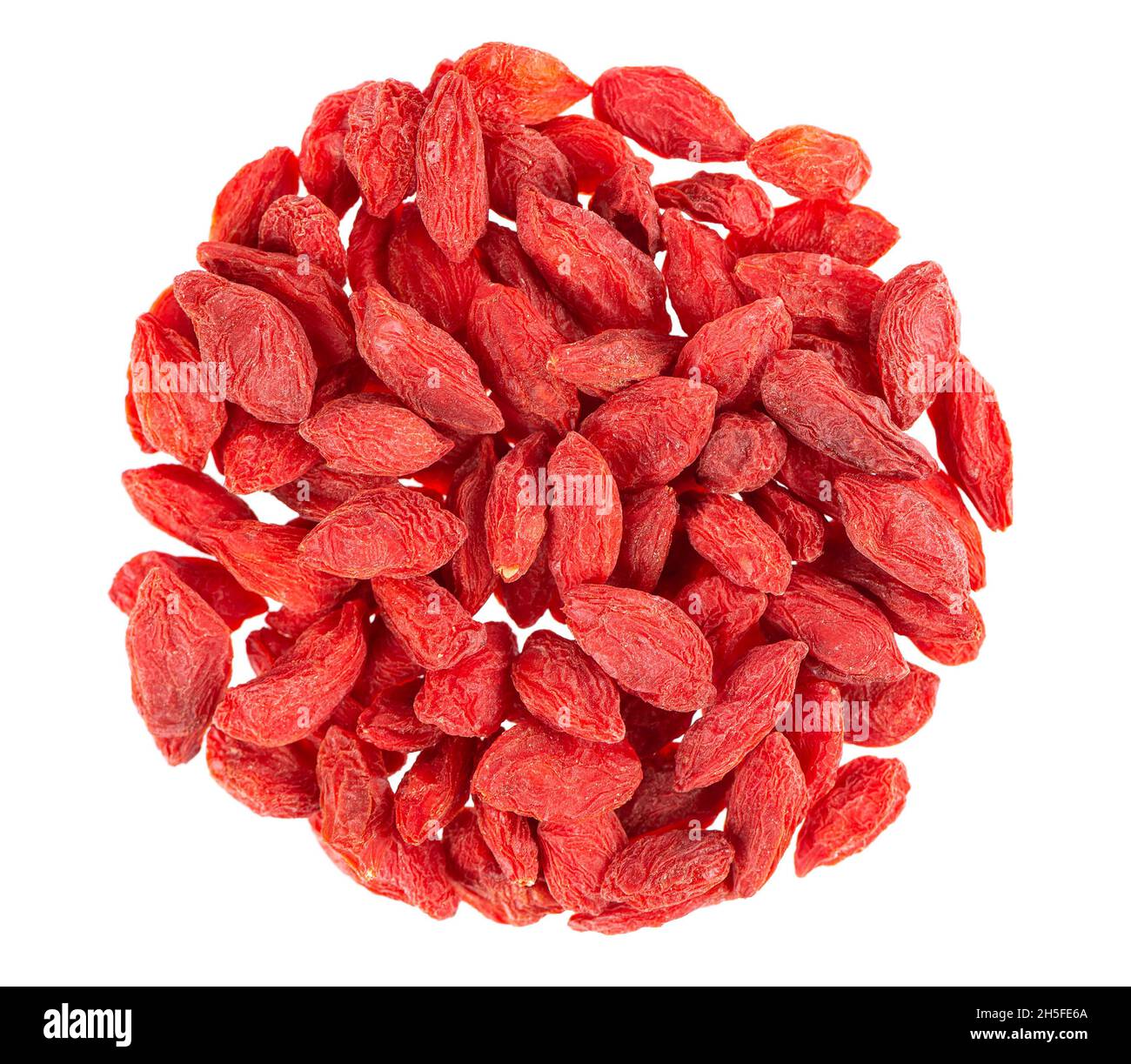 Chinese wolfberries isolated on white background. Heap of dried goji ...
