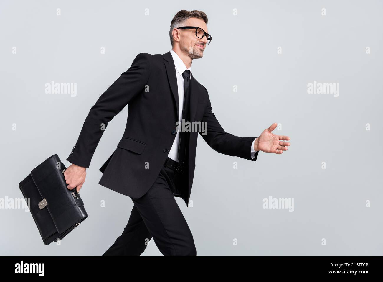 Profile side photo of leader chief banker go briefing greet welcome ...