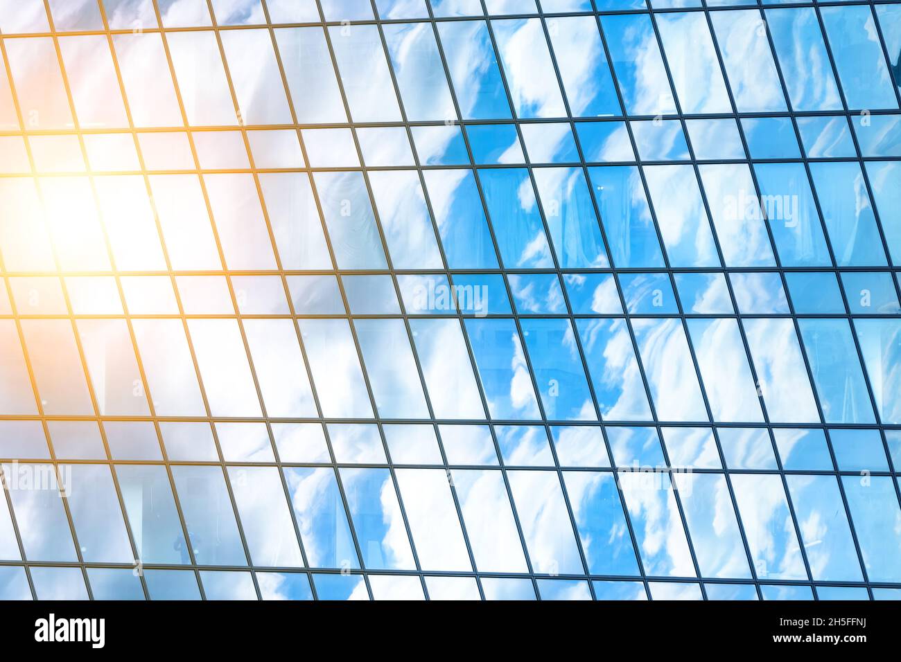 Solar flare on the one window of an office building Stock Photo - Alamy