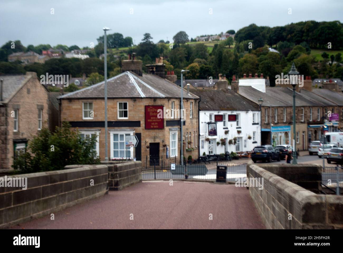 Pub and other buildings from Haydon Old Bridge, Haydon Bridge ...