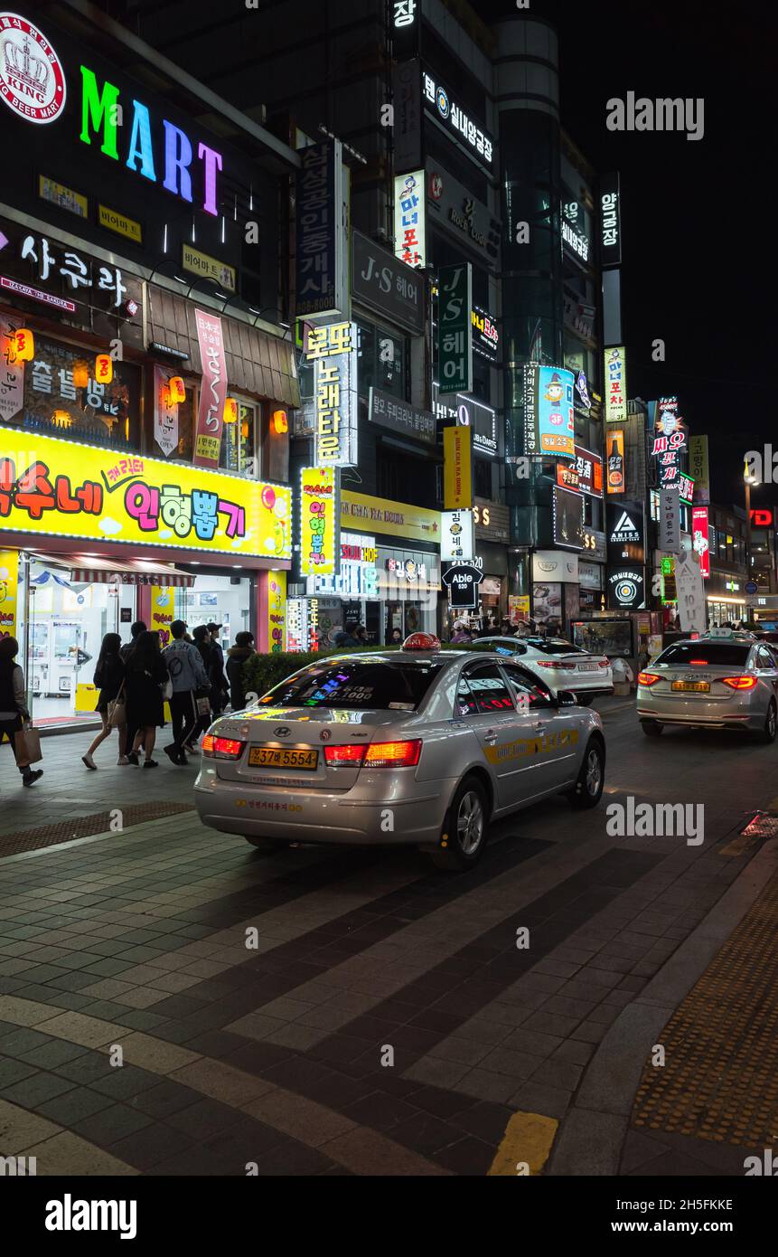 Busan, South Korea - March 23, 2018: Vertical night street view with ...