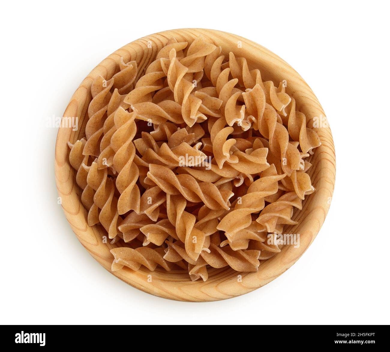 Wolegrain fusilli pasta from durum wheat in wooden bowl isolated on ...