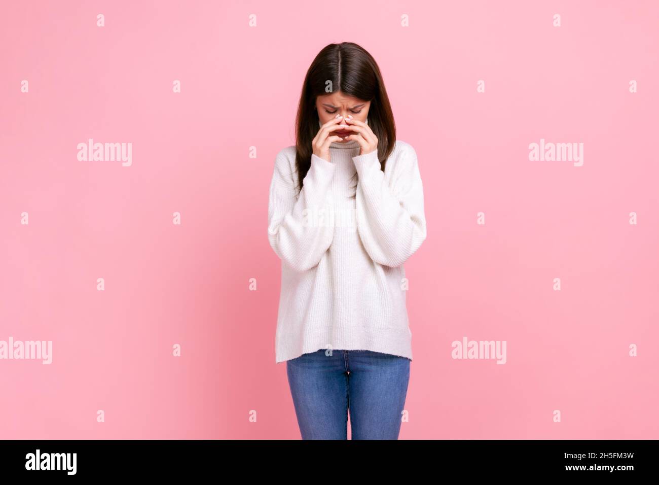 Sad upset female with dark hair standing crying, expressing sadness ...