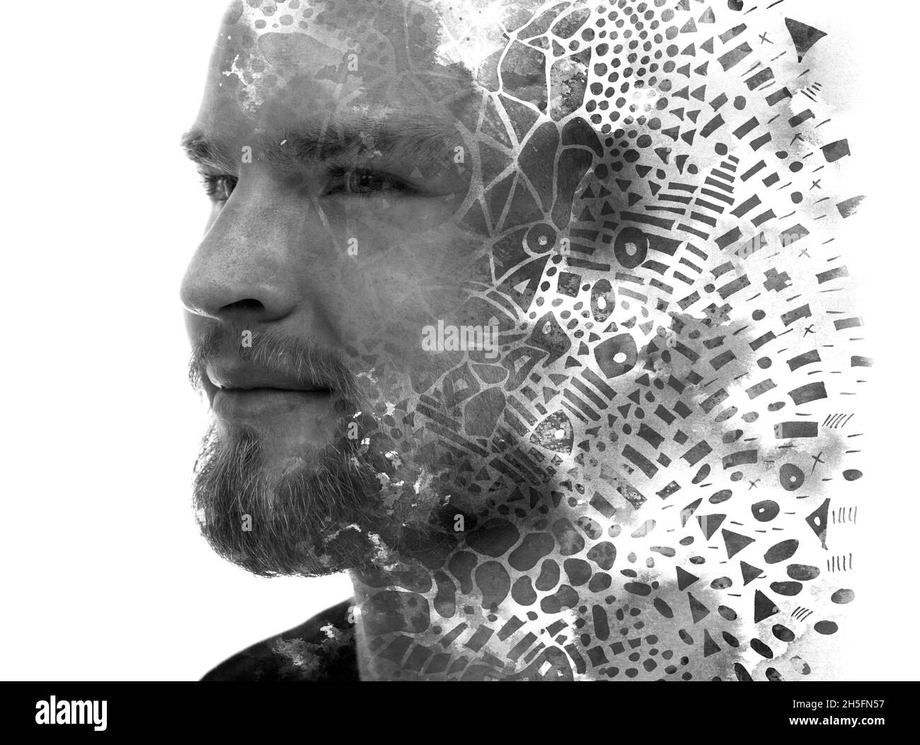 A black and white portrait of a man combined with abstract shapes ...