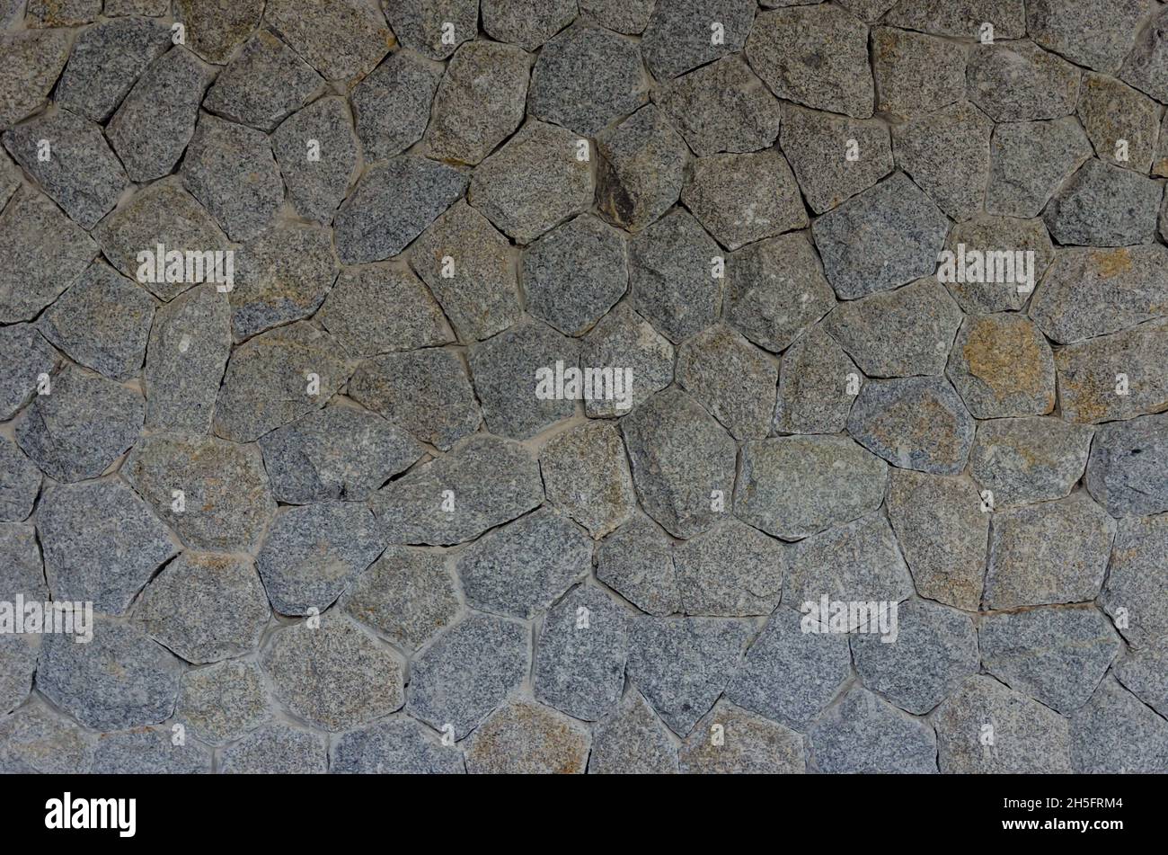 Rustic stone wall background Stock Photo - Alamy