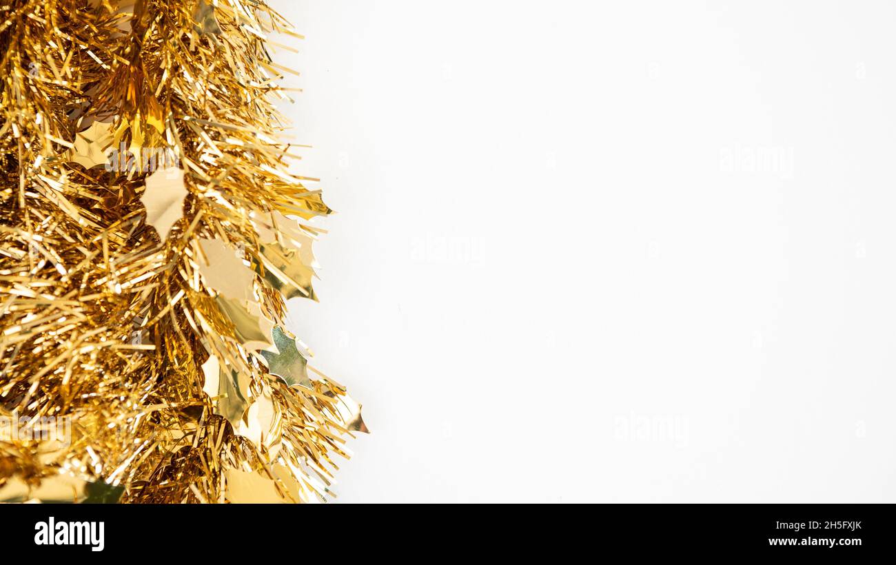 Beautiful golden tinsel christmas traditional decorations in winter ...