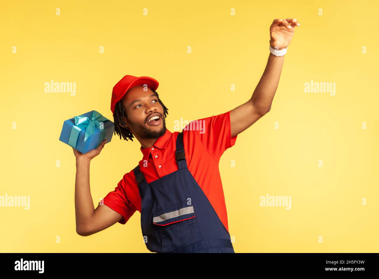African american delivery man carrying hi-res stock photography and ...
