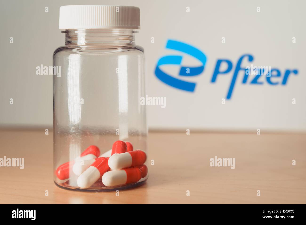 Barcelona, Spain. November 2021: Prescription bottle and capsules ...