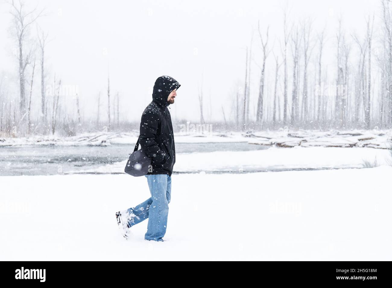 Man walking in blizzard hi-res stock photography and images - Alamy