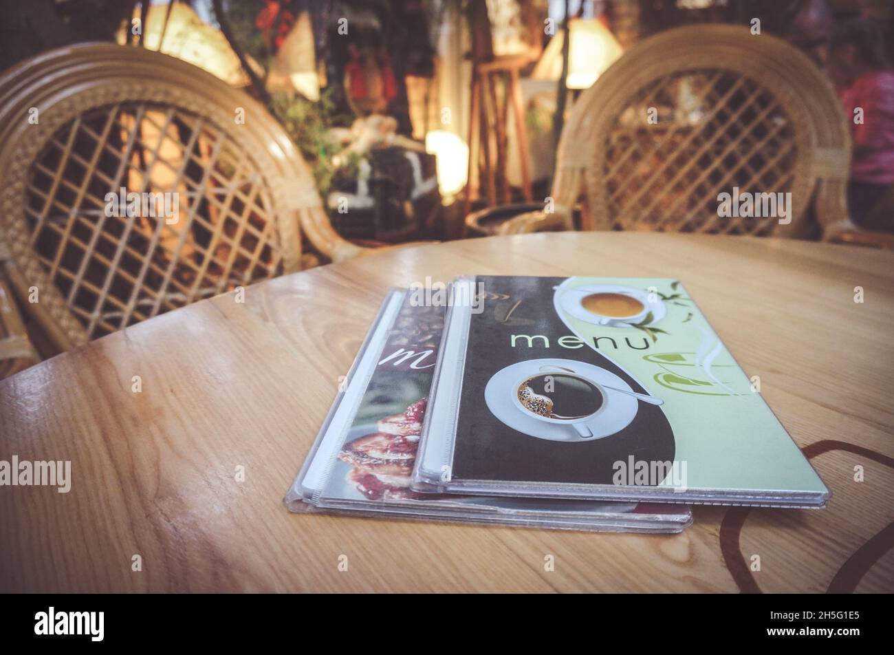 POZNAN, POLAND - Nov 20, 2016: A menu laying on a restaurant table in ...