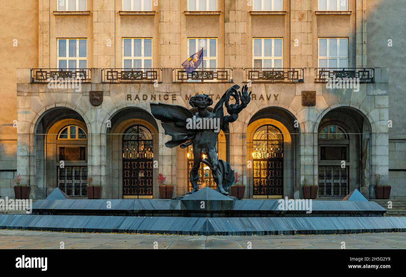 A picture of the Ostrava New City Hall and the statue in front of it ...