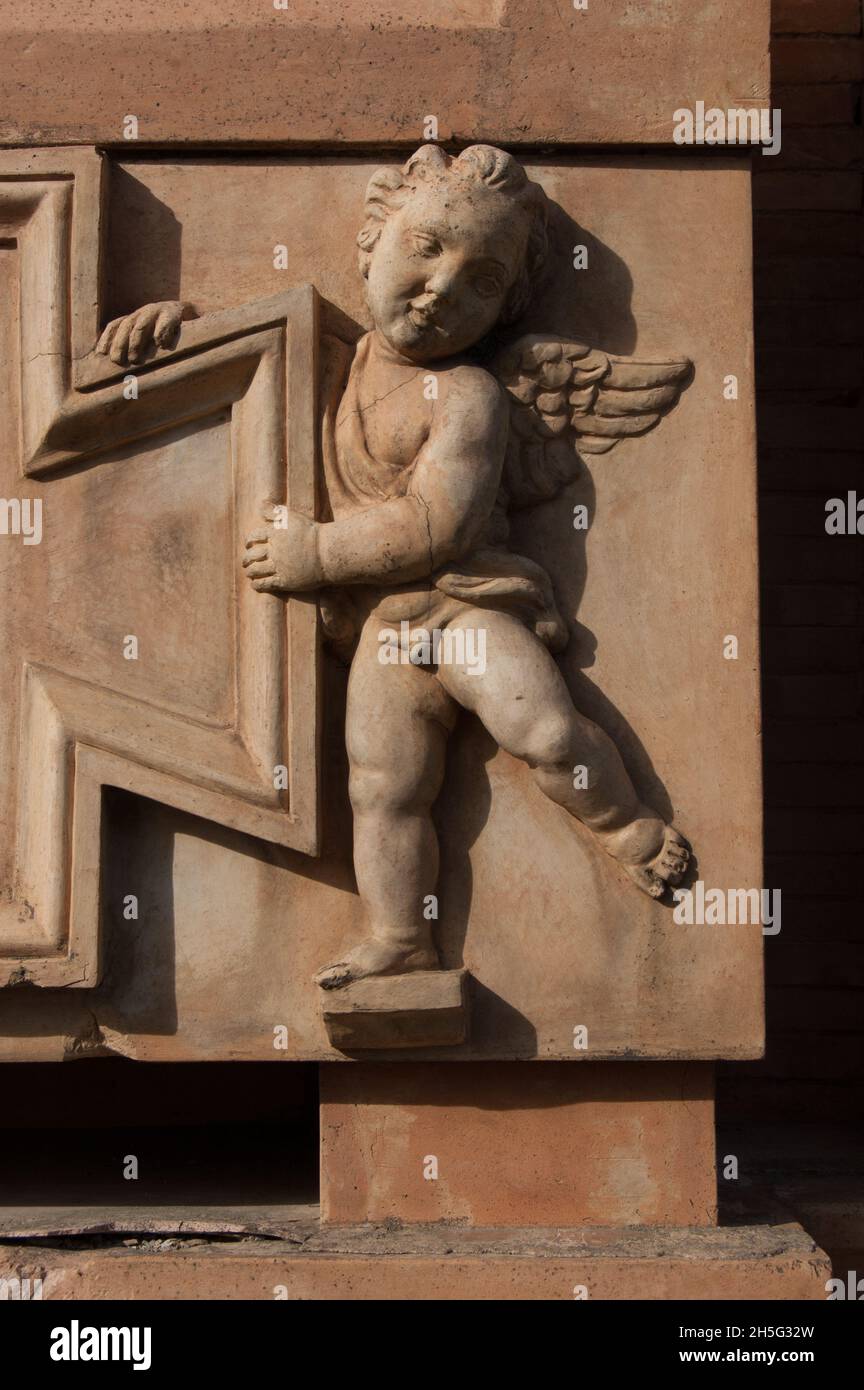 bas-relief of an angel inside a cemetery in Italy Stock Photo - Alamy