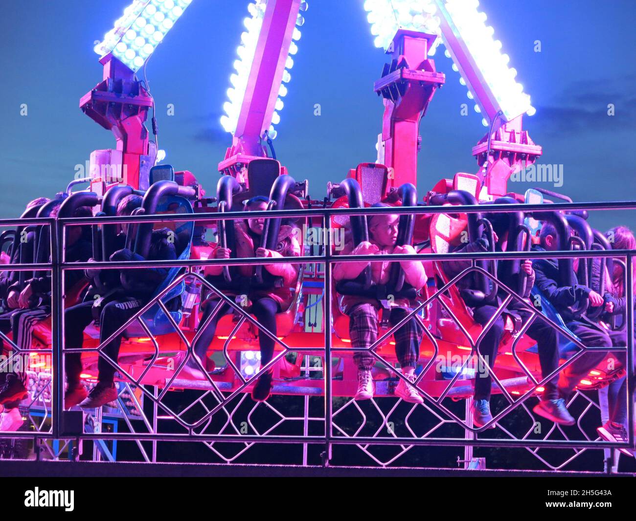 Thrill of the Funfair: children strapped into their seats ready for the ...