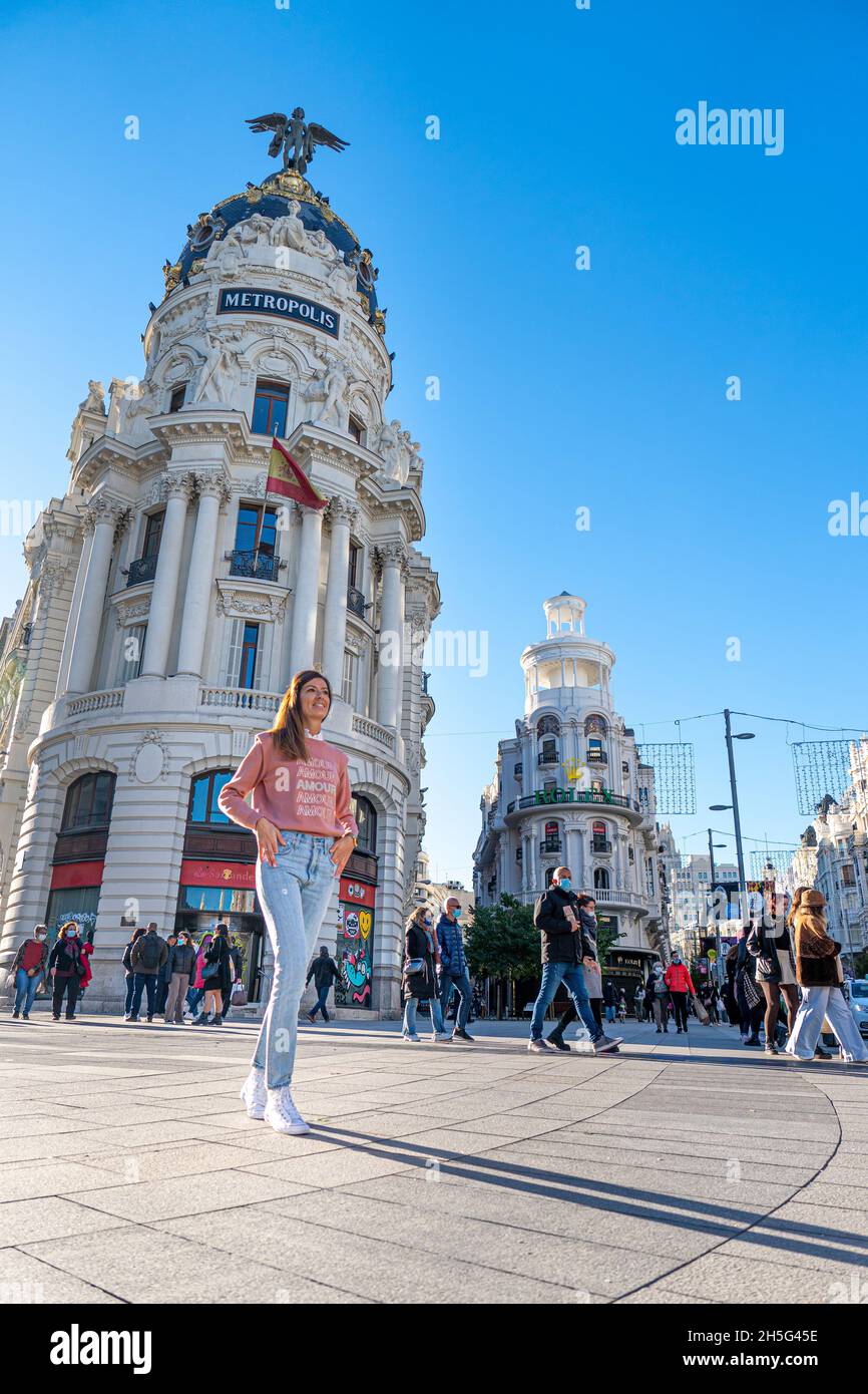 Woman in jeans posing on Gran Via in Madrid Stock Photo - Alamy
