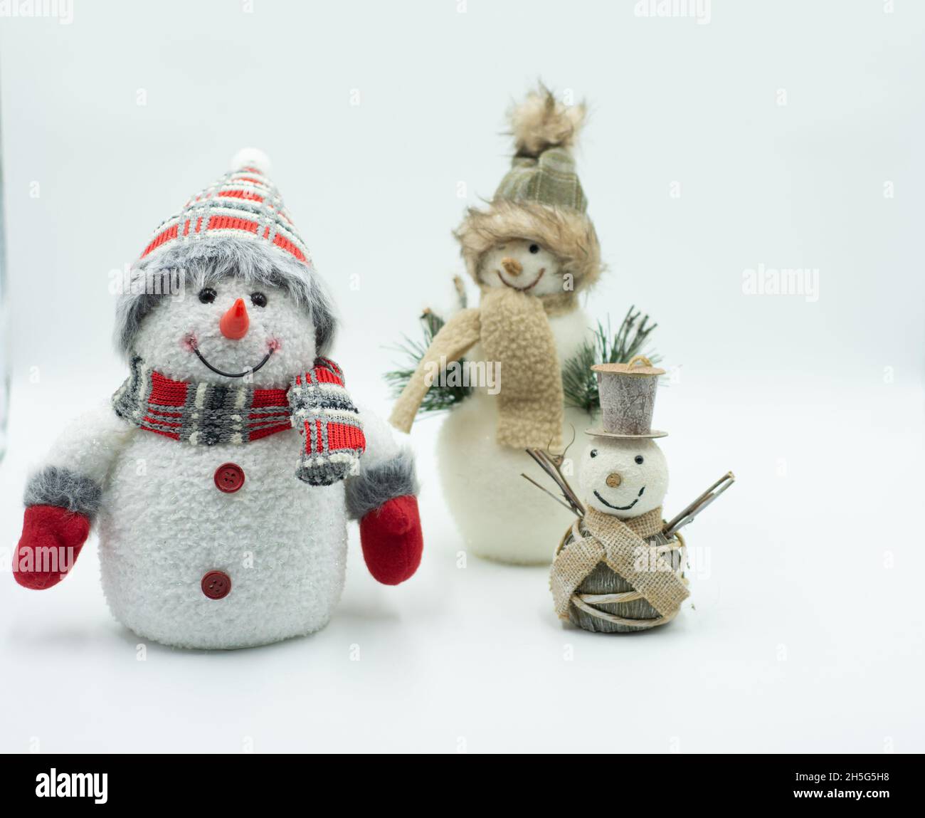 Snowman isolated on white background Stock Photo - Alamy
