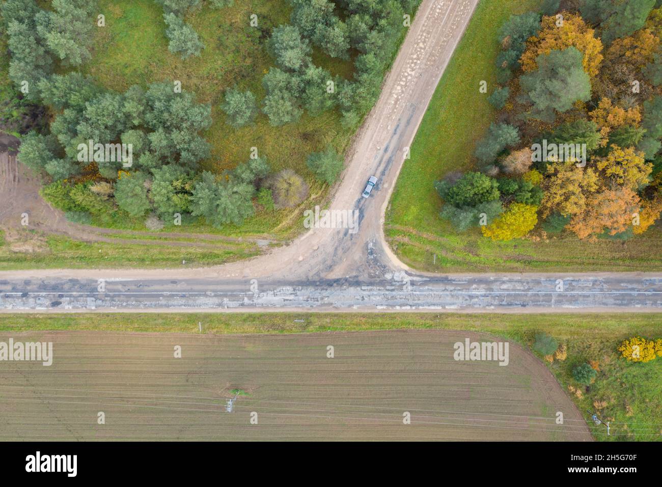 Aerial top down view of road interchange or intersection with single ...