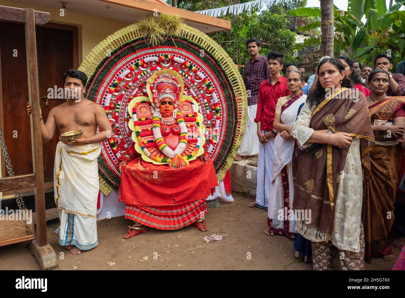 Theyyam artist perform during temple festival in Payyanur, Kerala ...