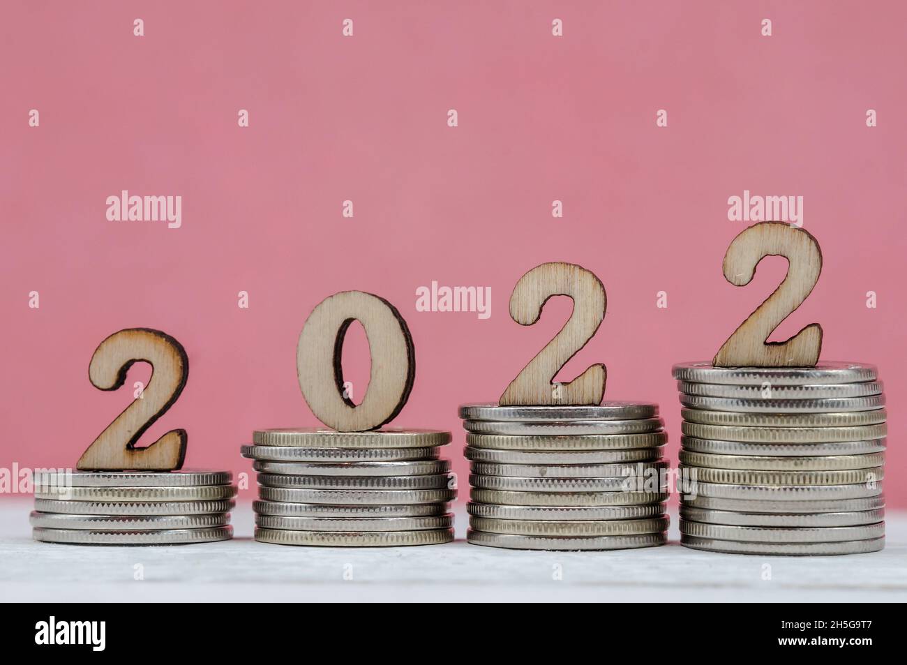 Coins and Figures 2022. Banner 2022. Money stacked in columns Stock ...