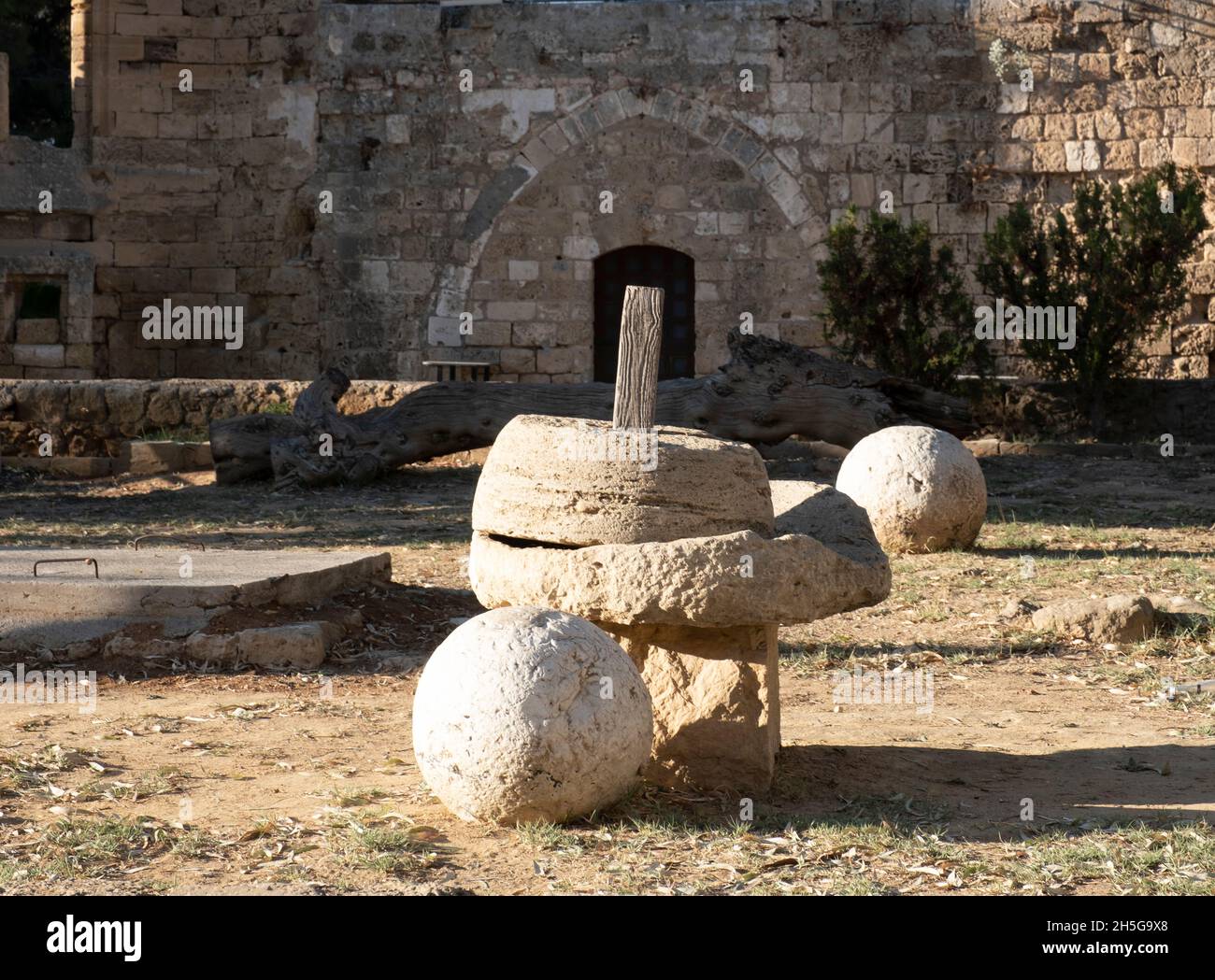 Historic stone olive press, Venetian palace, Famagusta, Cyprus Stock ...