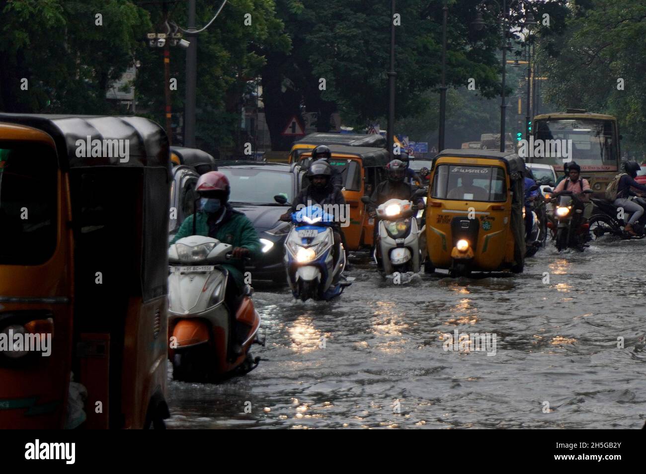 Chennai, Tamil Nadu, India. 9th Nov, 2021. People ride their vehicles ...