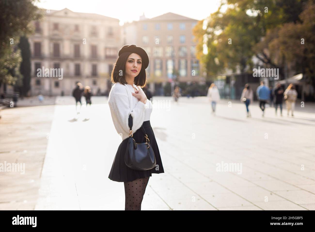 Lady carrying purse hi-res stock photography and images - Alamy
