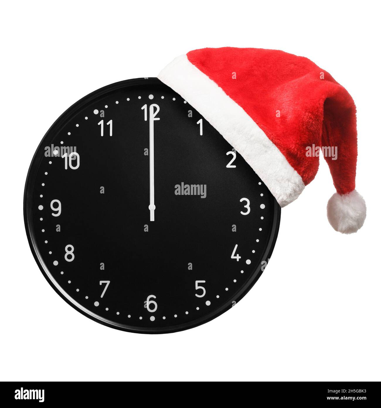 Santa hat and office clock Stock Photo - Alamy