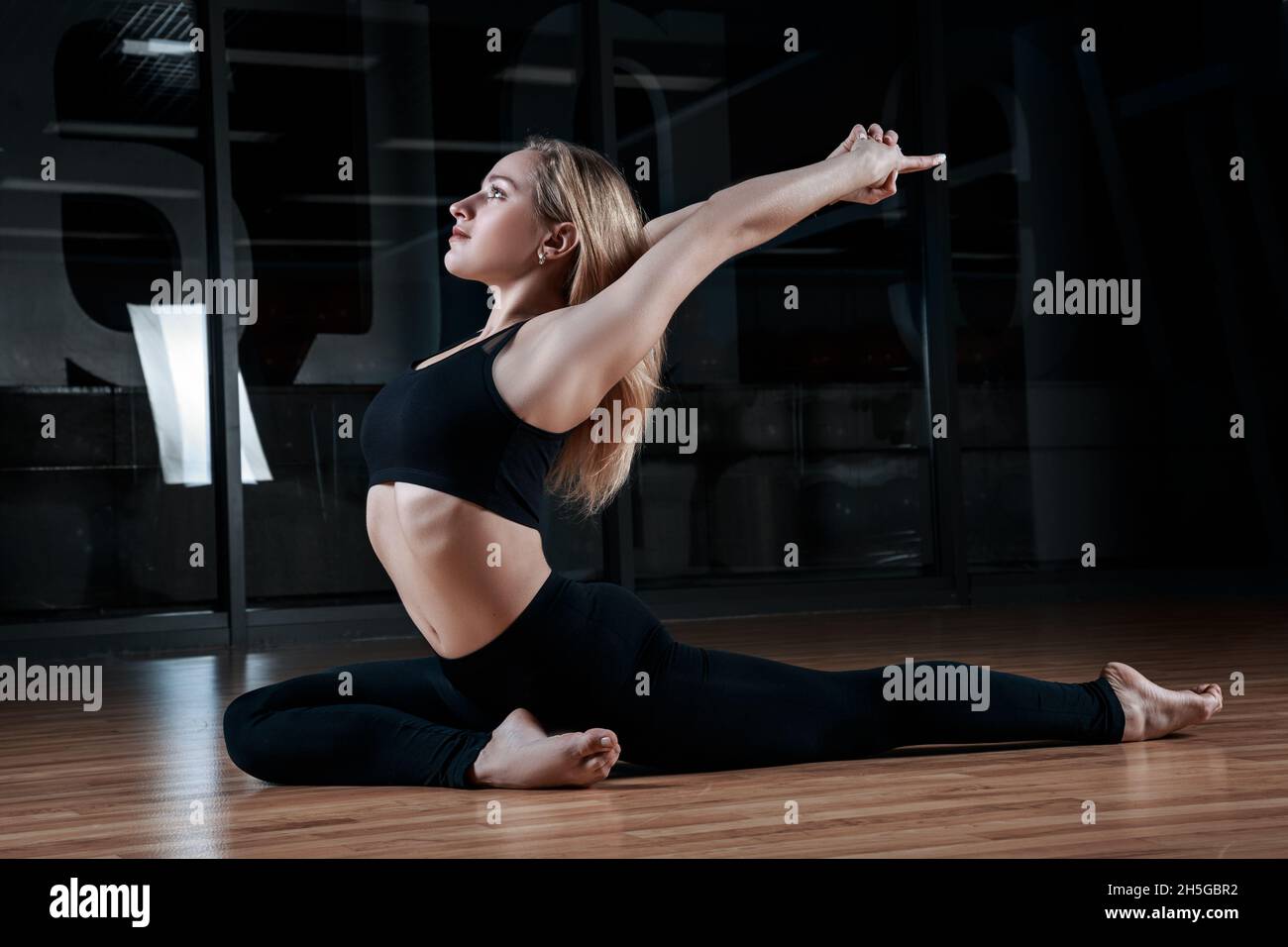 gymnast in the gym, pilates and stretching workout, fitball workout ...