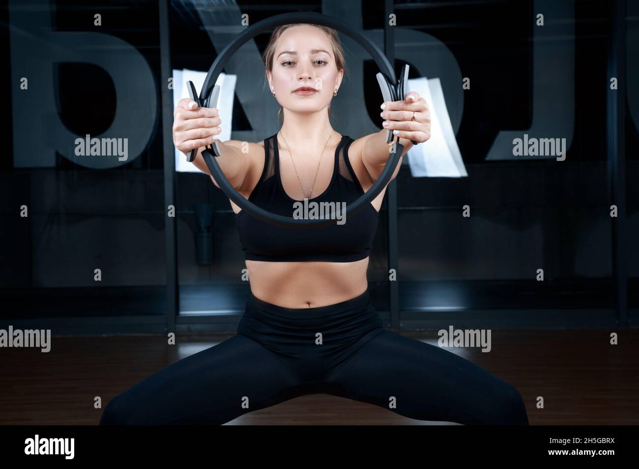 gymnast in the gym, pilates and stretching workout, fitball workout ...