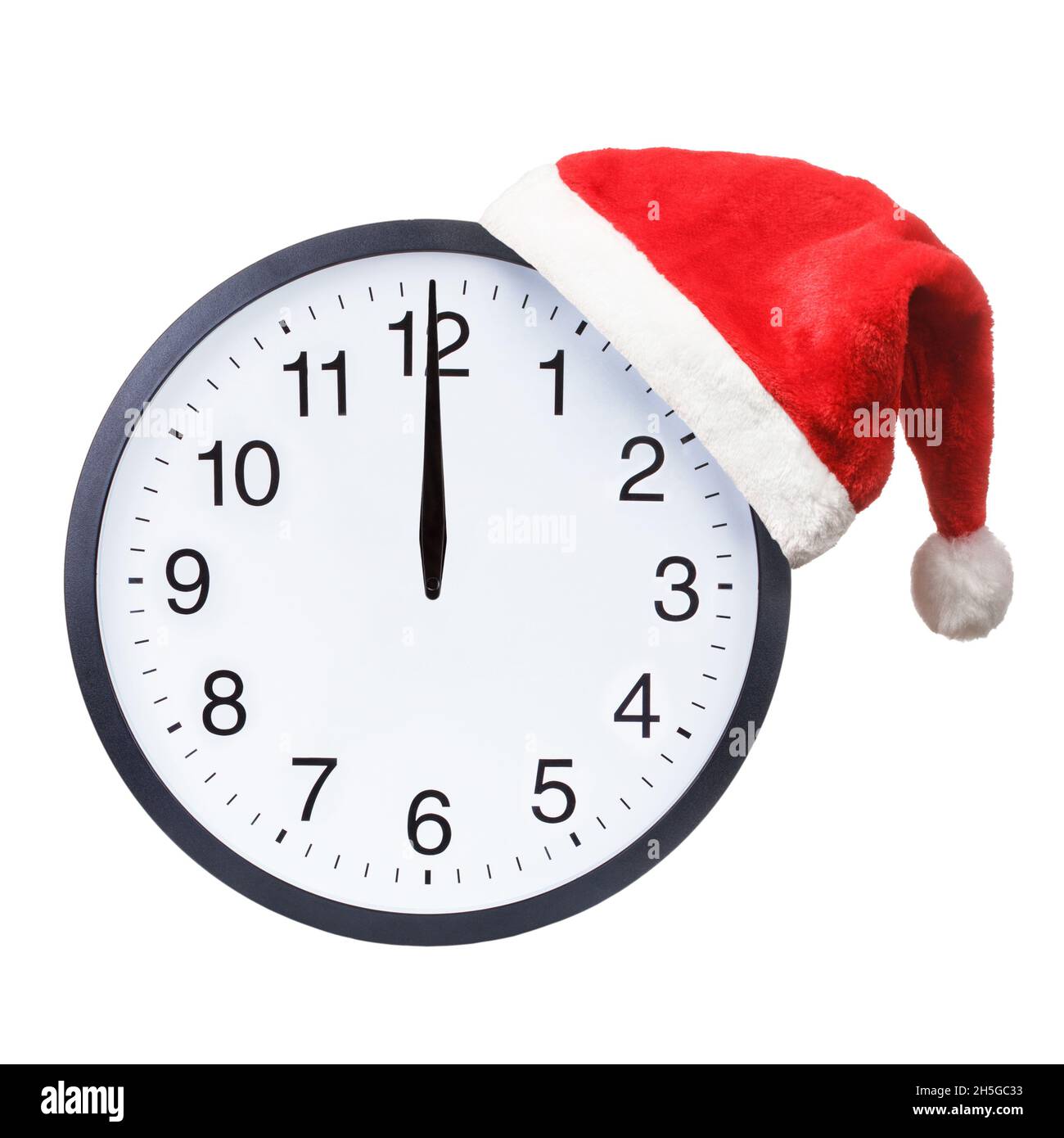 Santa hat and office clock Stock Photo - Alamy
