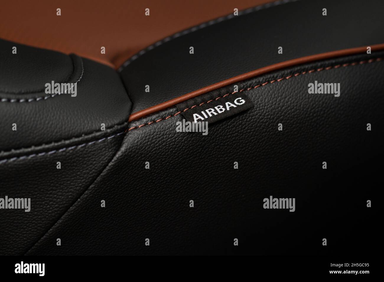 Close up view of airbag label on the side of a car seat. Airbag safety ...
